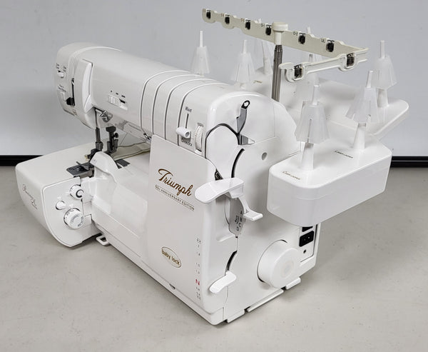 used Baby Lock Triumph air-thread serger (light use) with Extra Feet ...