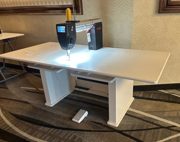 used BERNINA Q20 longarm in a Koala sitdown table – Aurora Sewing Center